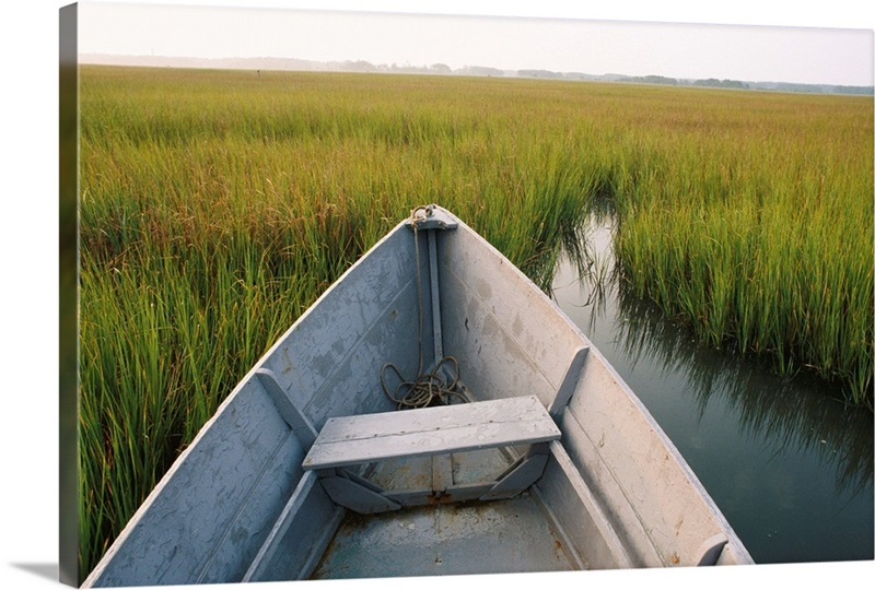 A rowboat rests in the marsh of Assateague Island.; Assateague Island ...