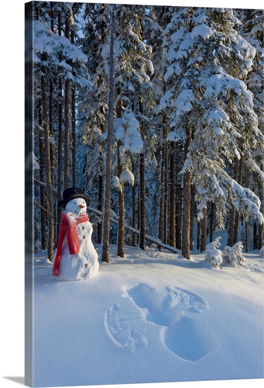 Snowman and freshly made snow angel | Great Big Canvas