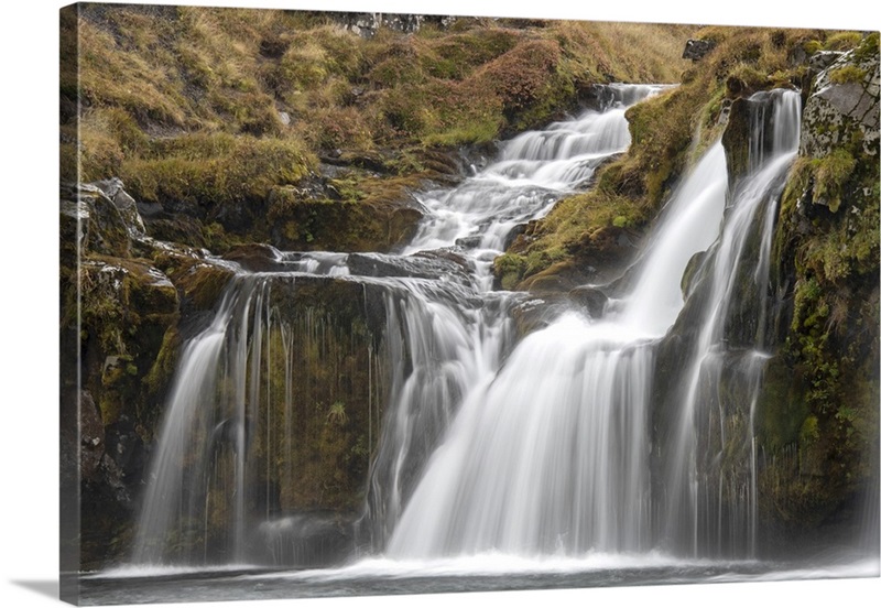 Waterfalls Cascading Over The Cliffs In The Rugged Countryside, Iceland ...