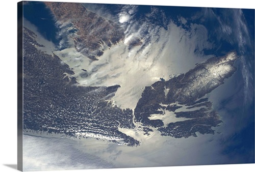 The highlands of Cape Breton still wear the winter's snow, sun ...