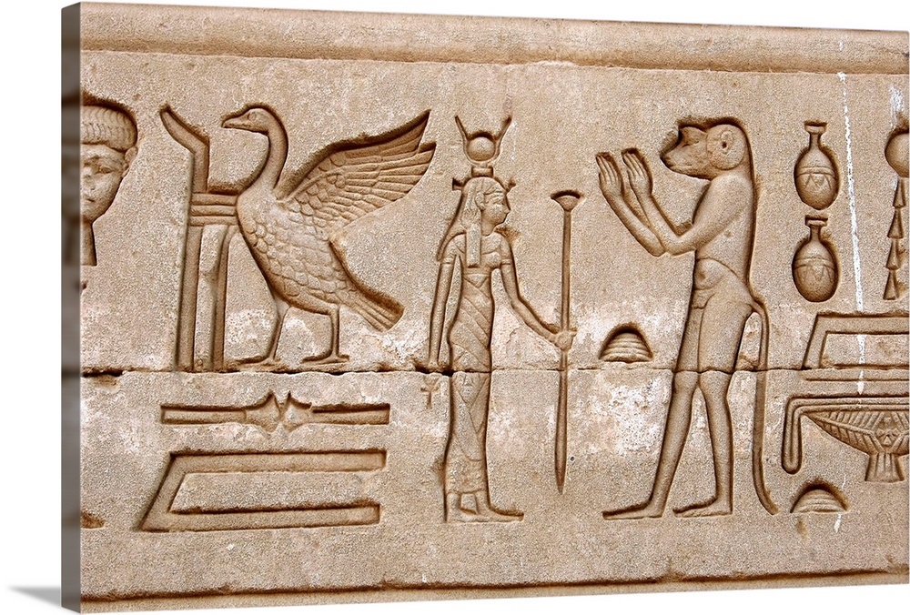 Ancient Egyptian hieroglyphs carved on the wall of Hathor Temple Wall ...