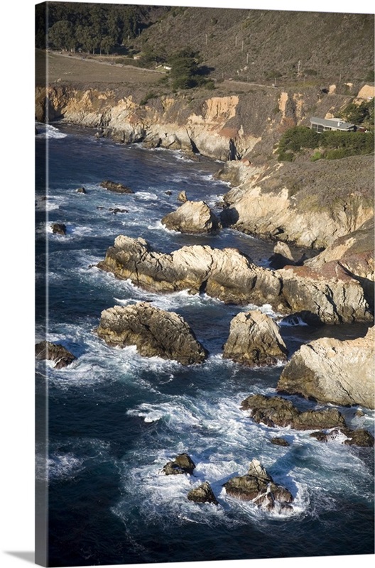 California, Big Sur, cliffs drop down to the sweeping coastline on ...