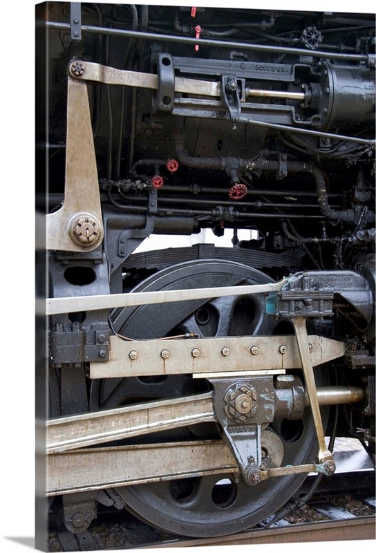 Close up detail view of a steam locomotive drive wheel | Great Big Canvas