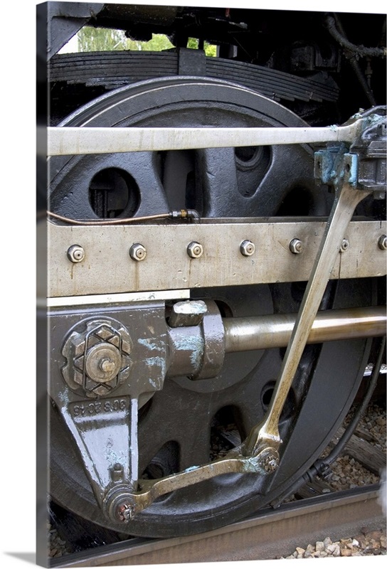 Close up detail view of steam locomotive drive wheel | Great Big Canvas