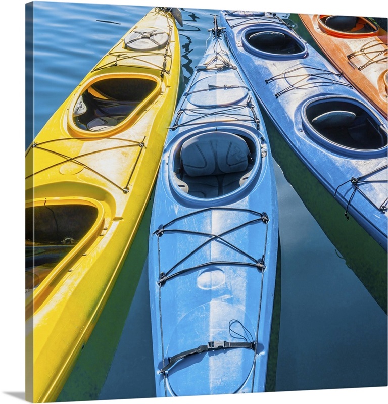 Four Colorful Kayaks Positioned In An Array | Great Big Canvas