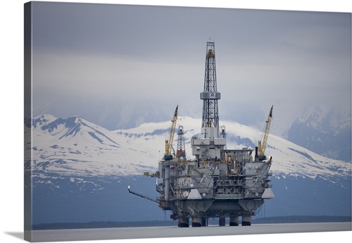 Offshore oil drilling rig in Cook Inlet and distant Alaska Range peaks ...