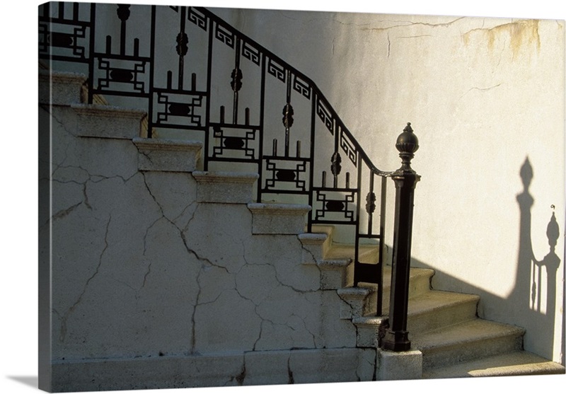 Wrought iron railing and steps with shadow detail | Great Big Canvas