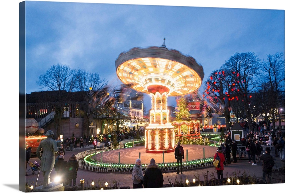 Denmark, Zealand, Copenhagen, Tivoli Gardens, Spinning carousel Wall ...