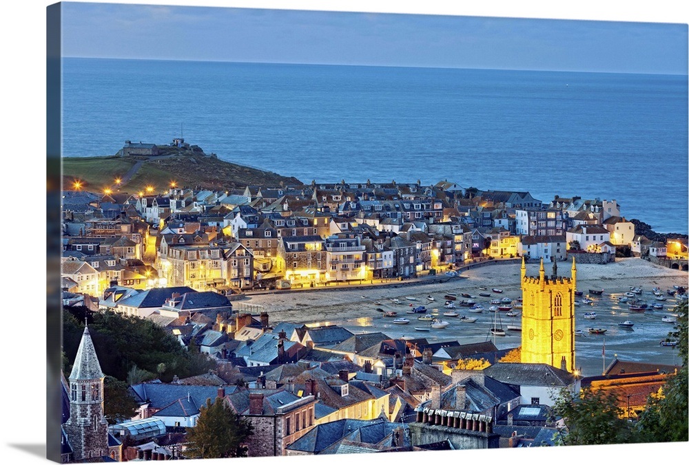England, Cornwall, St Ives, Harbor at night with the bell tower of ...
