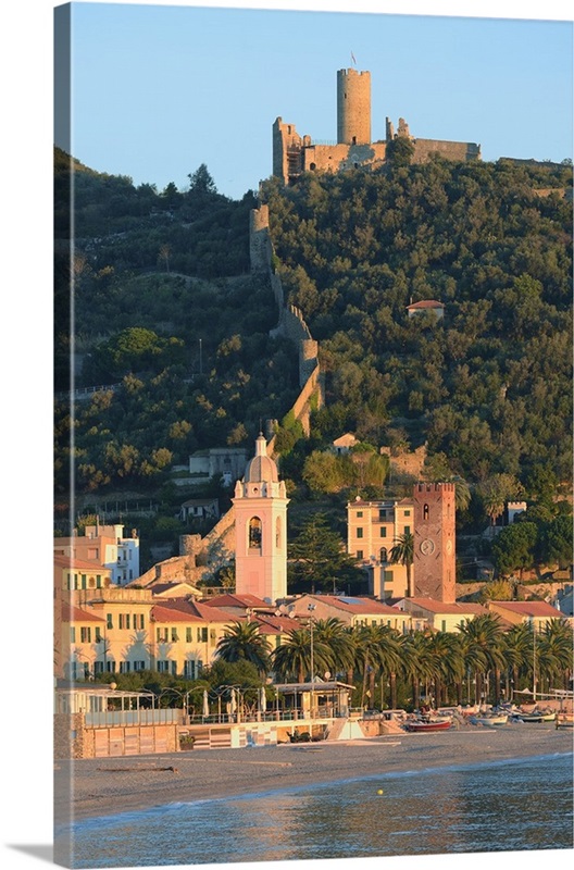 Italy, Noli, Cathedral bell-tower and Castello Ursino on top of the ...