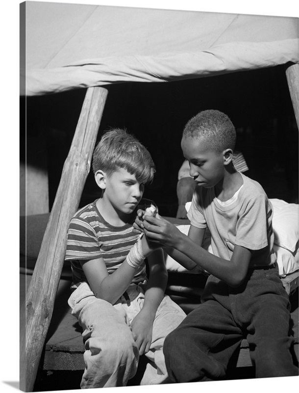 African American Camper Helps White Friend With His Bandaged Hand ...