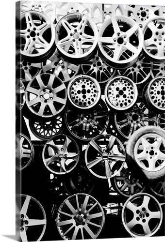 Aluminium and steel car wheels at auto repair shop. | Great Big Canvas