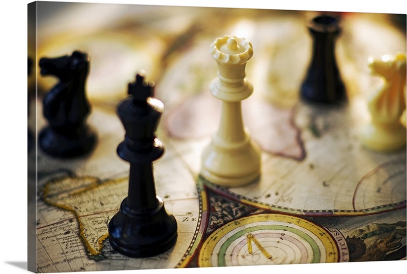 Chess pieces on old world map | Great Big Canvas