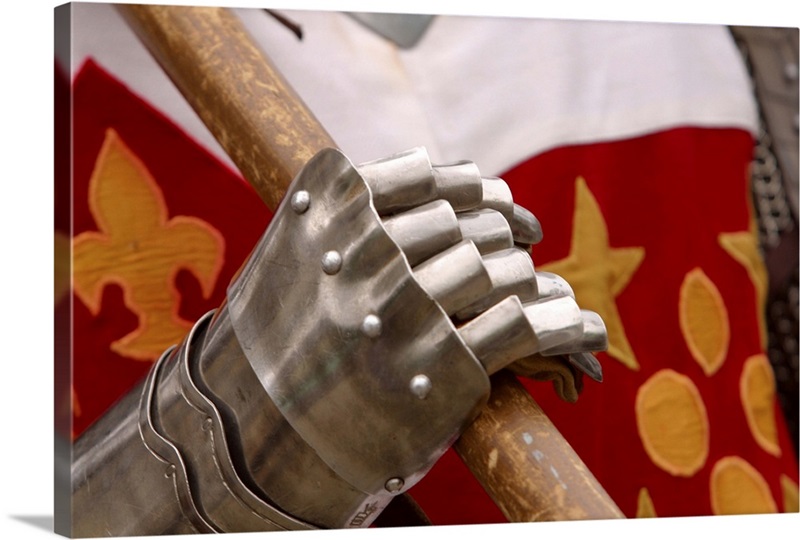 Close-up of articulated hand of armor gripping weapon | Great Big Canvas