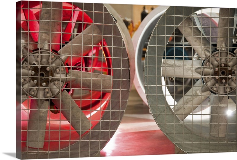 Close up of industrial fans behind metal grate | Great Big Canvas