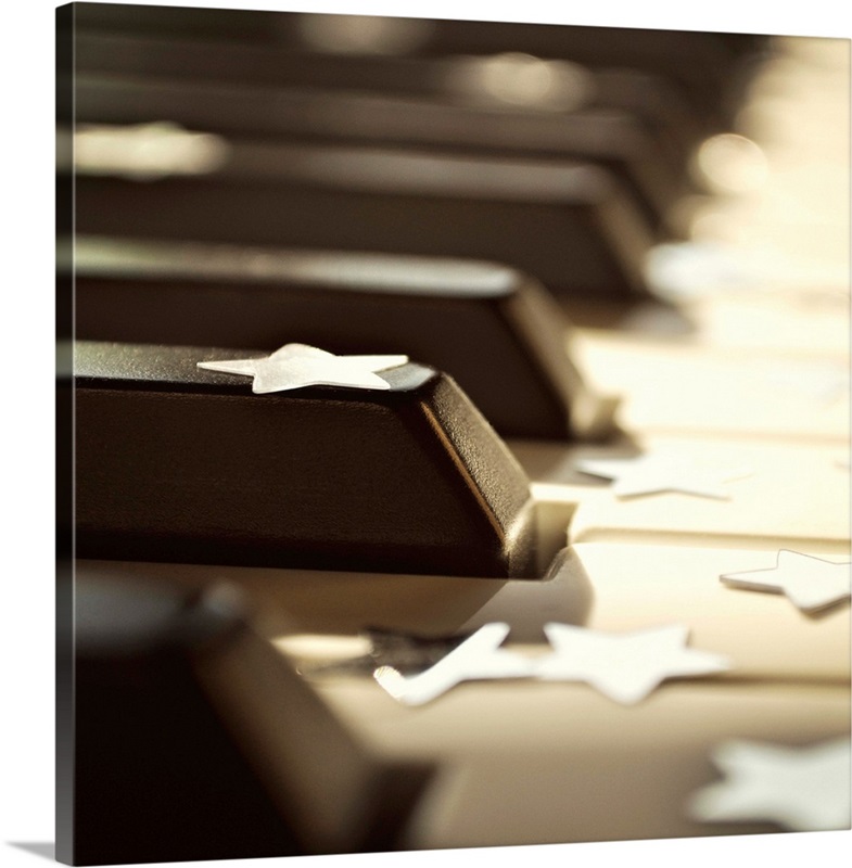 Close up of piano keys with stars. | Great Big Canvas