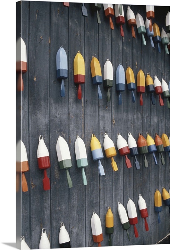 Colourful wooden block hanging on shed wall | Great Big Canvas