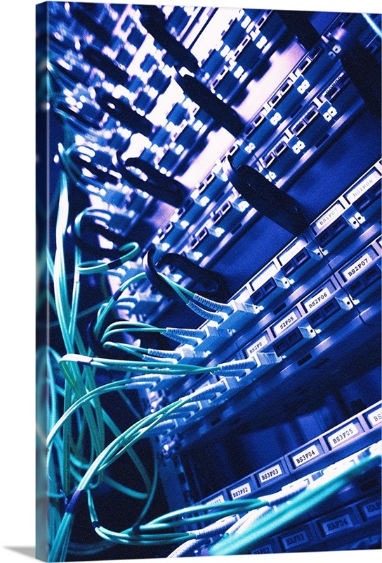 Low angle close-up of cables and plugs going into a computer system ...