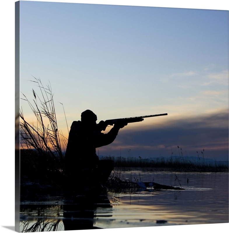 Man duck hunting at dawn | Great Big Canvas