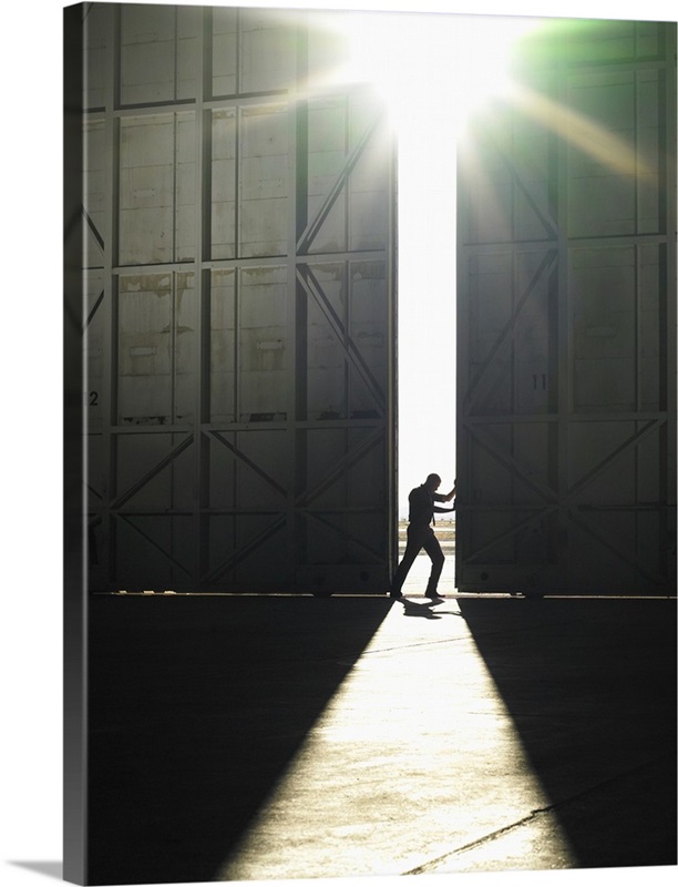 Man pushing door open | Great Big Canvas