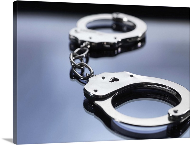 Metal handcuffs | Great Big Canvas