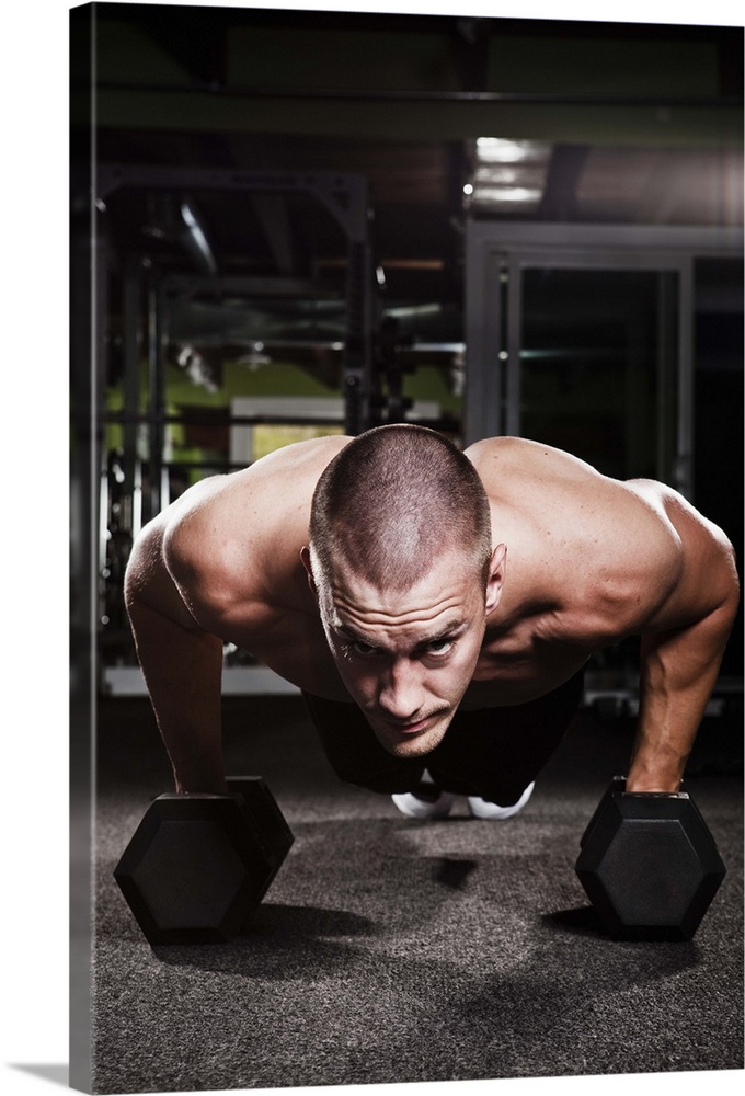 Mid adult man working out in gym | Great Big Canvas