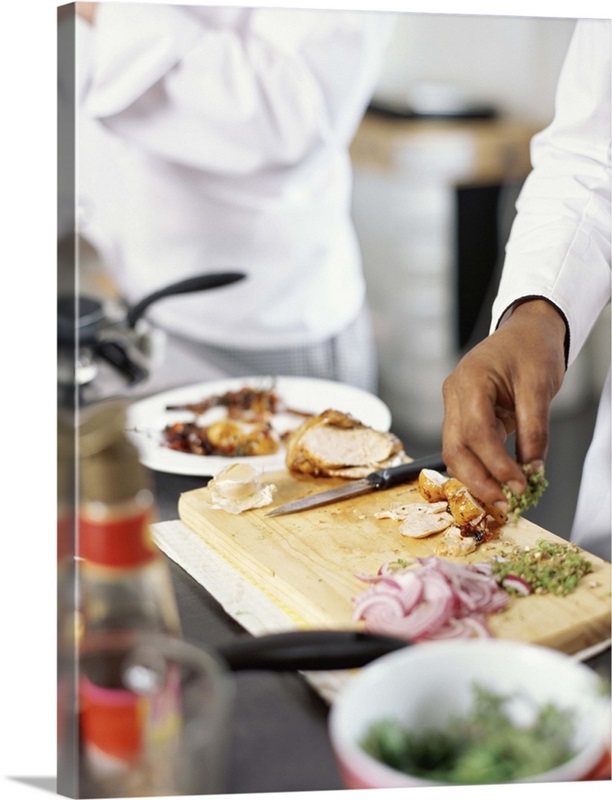 Mid section view of two chefs cooking food in the kitchen | Great Big ...
