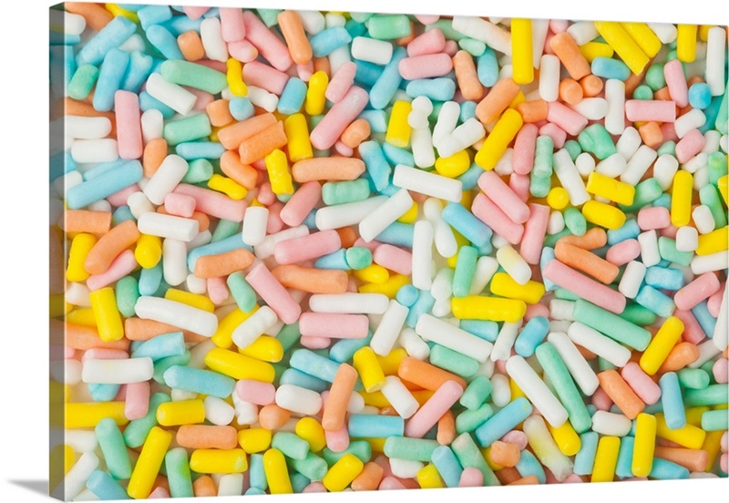 Small scoop of pastel-colored dessert sprinkles. | Great Big Canvas