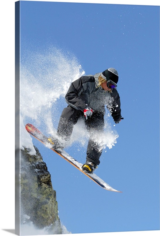 Snowboarder jumping off ledge | Great Big Canvas