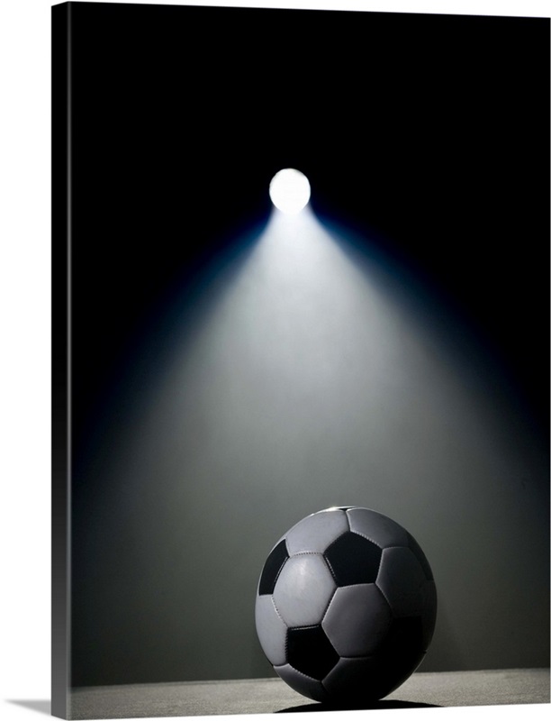 Soccer ball in spotlight | Great Big Canvas