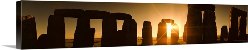 Sun rising over Stonehenge rock formation | Great Big Canvas