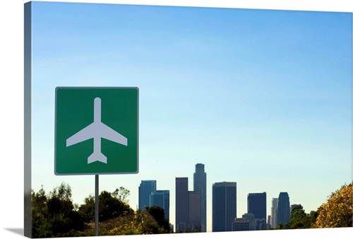 USA, California, Los Angeles, airport sign with city skyline in ...