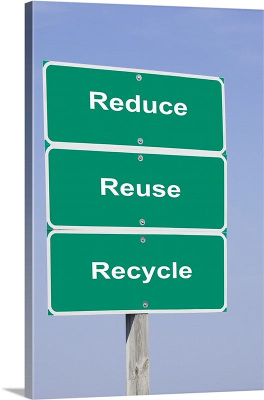 USA, Illinois, Metamora, Road signs reading REDUCE REUSE RECYCLE ...