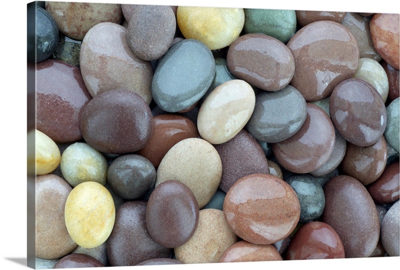 Wet shiny granite pebbles on beach, full frame | Great Big Canvas