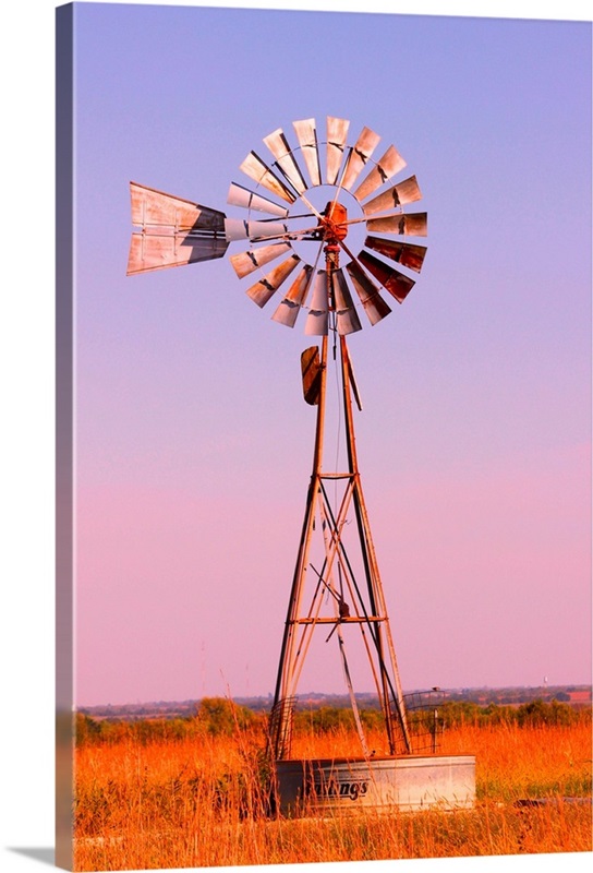 Windmill in pasture land at dawn | Great Big Canvas