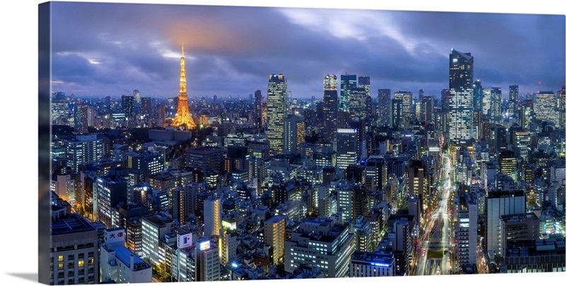 Japan, Tokyo, elevated night view of the city skyline and iconic ...