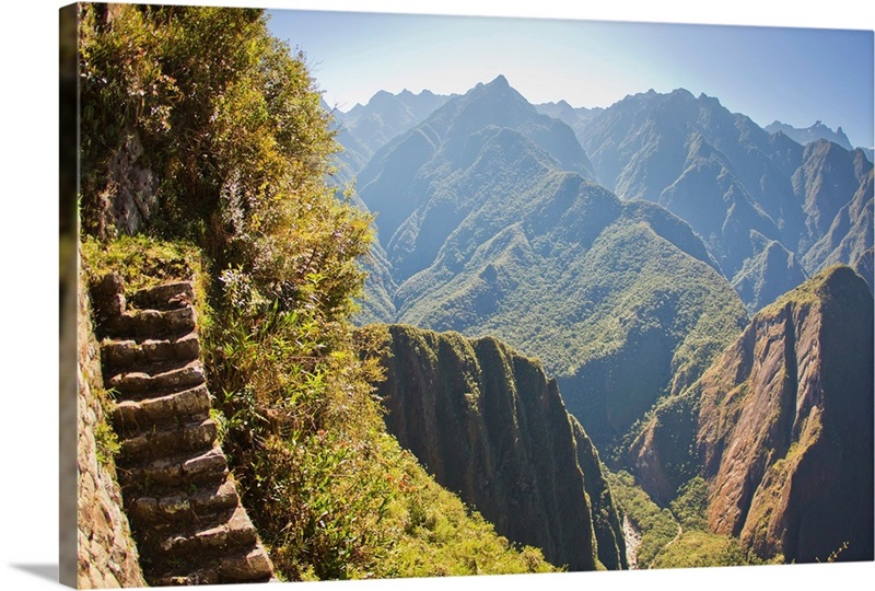 Steep stairs on a mountain side on the Inca trail at Machu Picchu ...