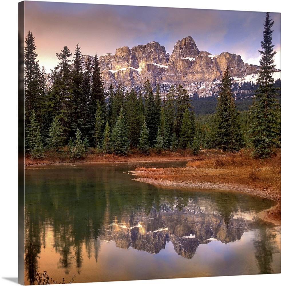 Castle Mountain and boreal forest reflected in lake, Banff National ...