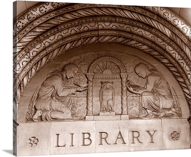 Detail of carvings on the wall of Powell Library, University of ...