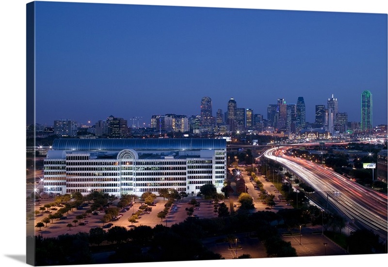 High angle view of a multiple lane highway in front of a city ...