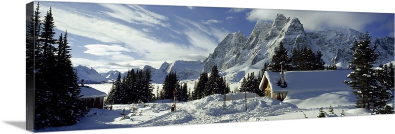 Lodge and mountains covered with snow, Tonquin Valley Backcountry Lodge ...