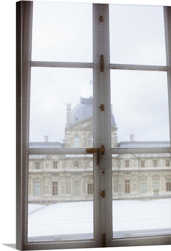 Louvre museum viewed through a window, Paris, Ile-de-France, France ...