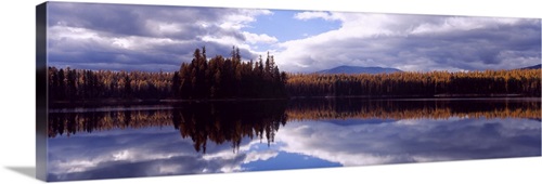 Reflection of clouds and trees in water, Little Bitterroot Lake ...