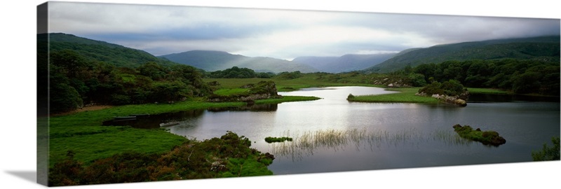Sunlight on water, distant mountains in mist, Ireland | Great Big Canvas