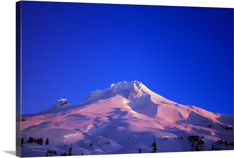 Sunrise light on snowy Mount Hood, clear blue sky, Oregon, united ...
