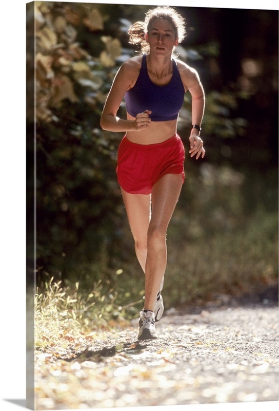 Female runner out on the trails | Great Big Canvas