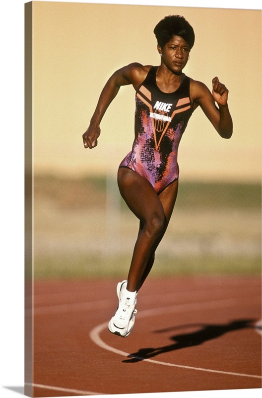 Female track and field athlete in action | Great Big Canvas