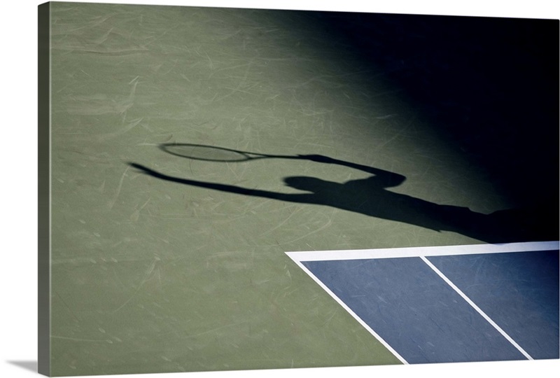 Shadow of tennis player serving | Great Big Canvas