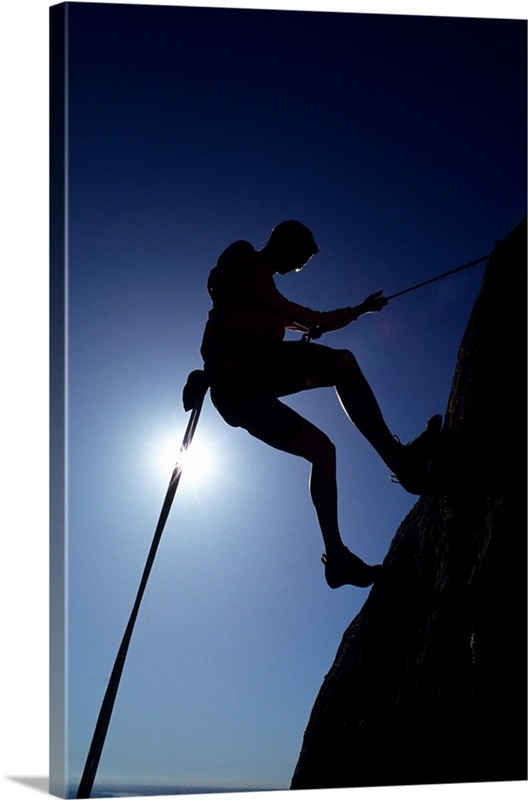 Silhouette of rock climber | Great Big Canvas