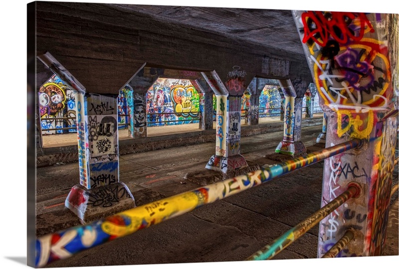 Graffiti covering the columns and railings in the Krog Street Tunnel in ...